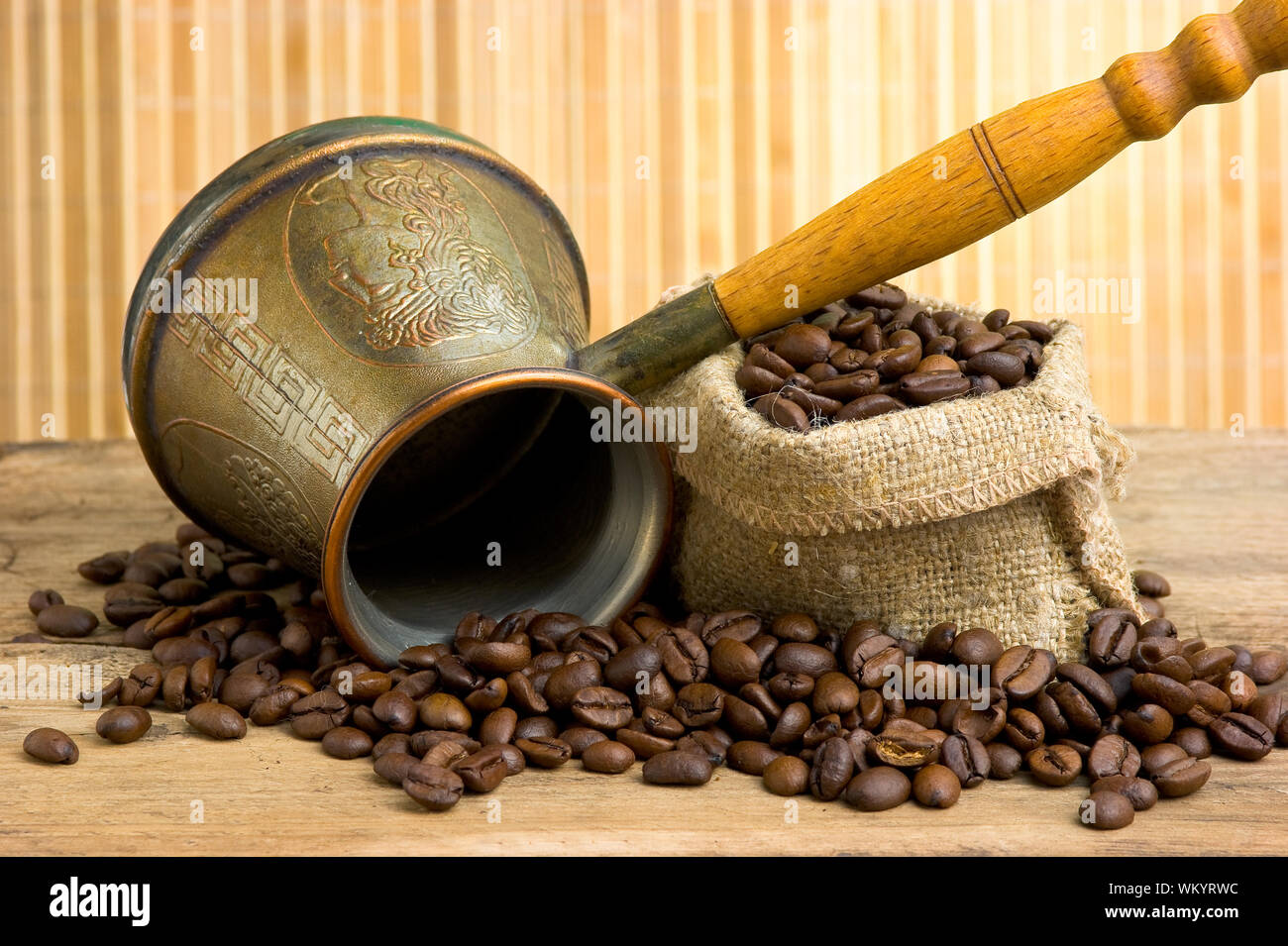 Coffee beans spilled out of the bag Stock Photo - Alamy