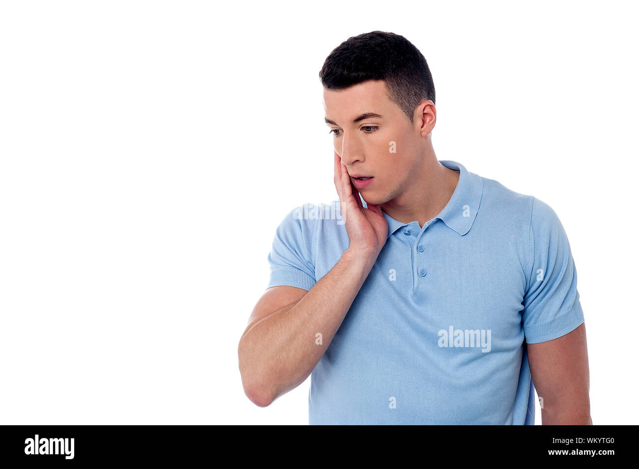 Young man suffering from severe tooth pain Stock Photo - Alamy