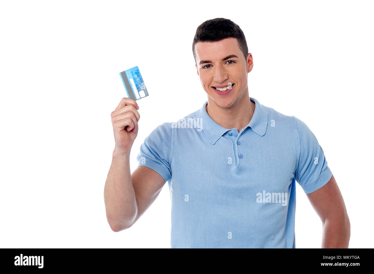Handsome young man showing his credit card Stock Photo - Alamy