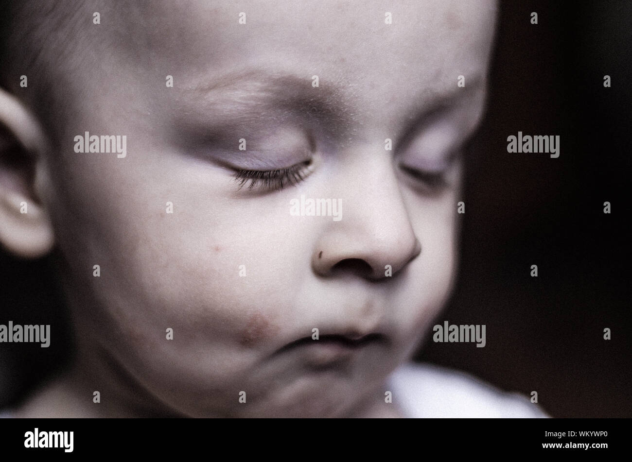 Cute baby girl eyes closed hi-res stock photography and images - Alamy