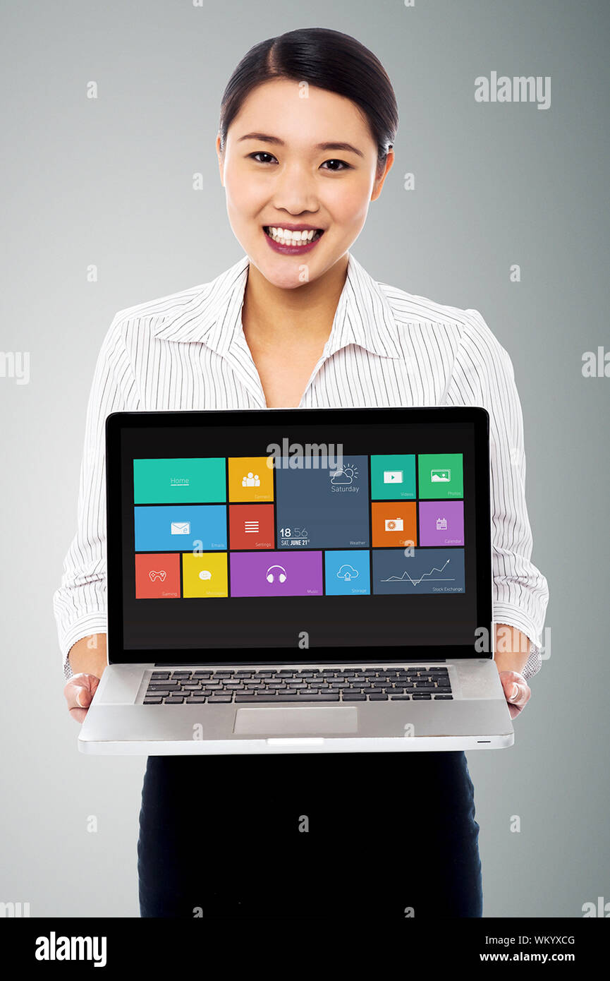 Laptop displaying female young hi-res stock photography and images - Alamy