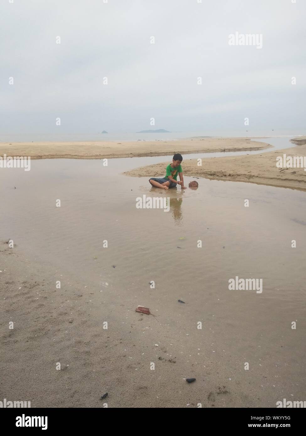 Boy playing sand pail shovel hi-res stock photography and images - Alamy