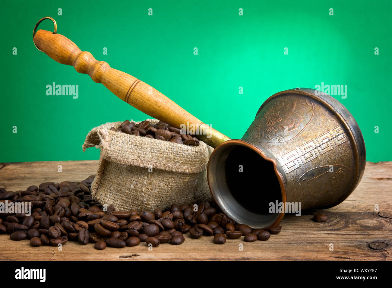 Coffee beans spilled out of the bag Stock Photo - Alamy