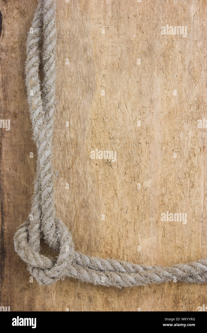 frame made of rope on the old board Stock Photo - Alamy