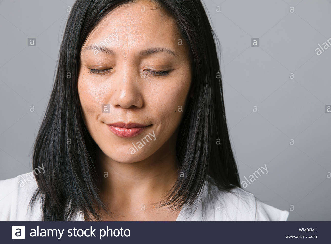 Portrait asian woman closed eyes hi-res stock photography and images - Alamy