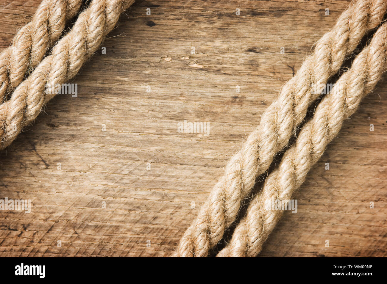 frame made of rope on the old board Stock Photo - Alamy