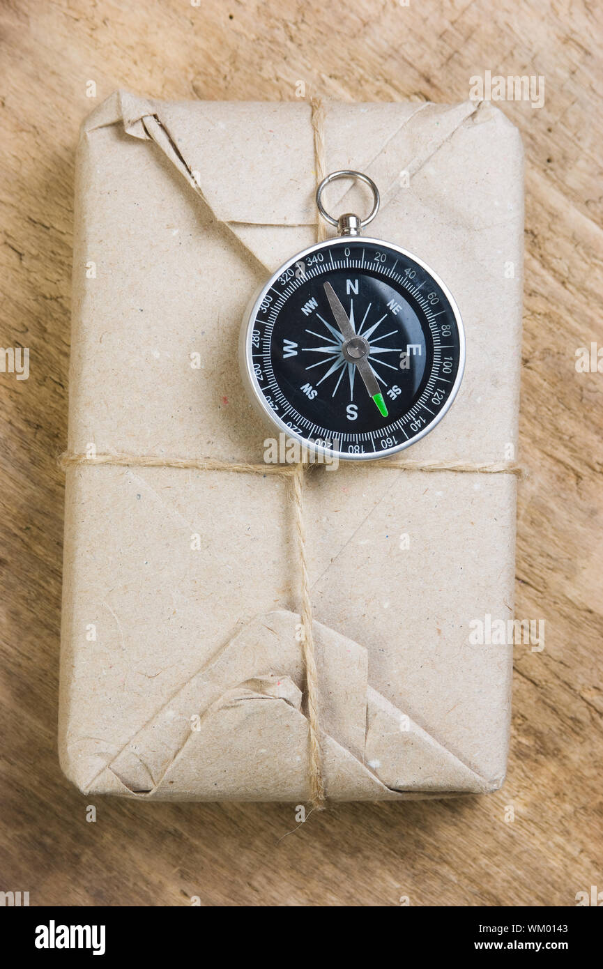 Postage on the background of an old wooden board Stock Photo - Alamy