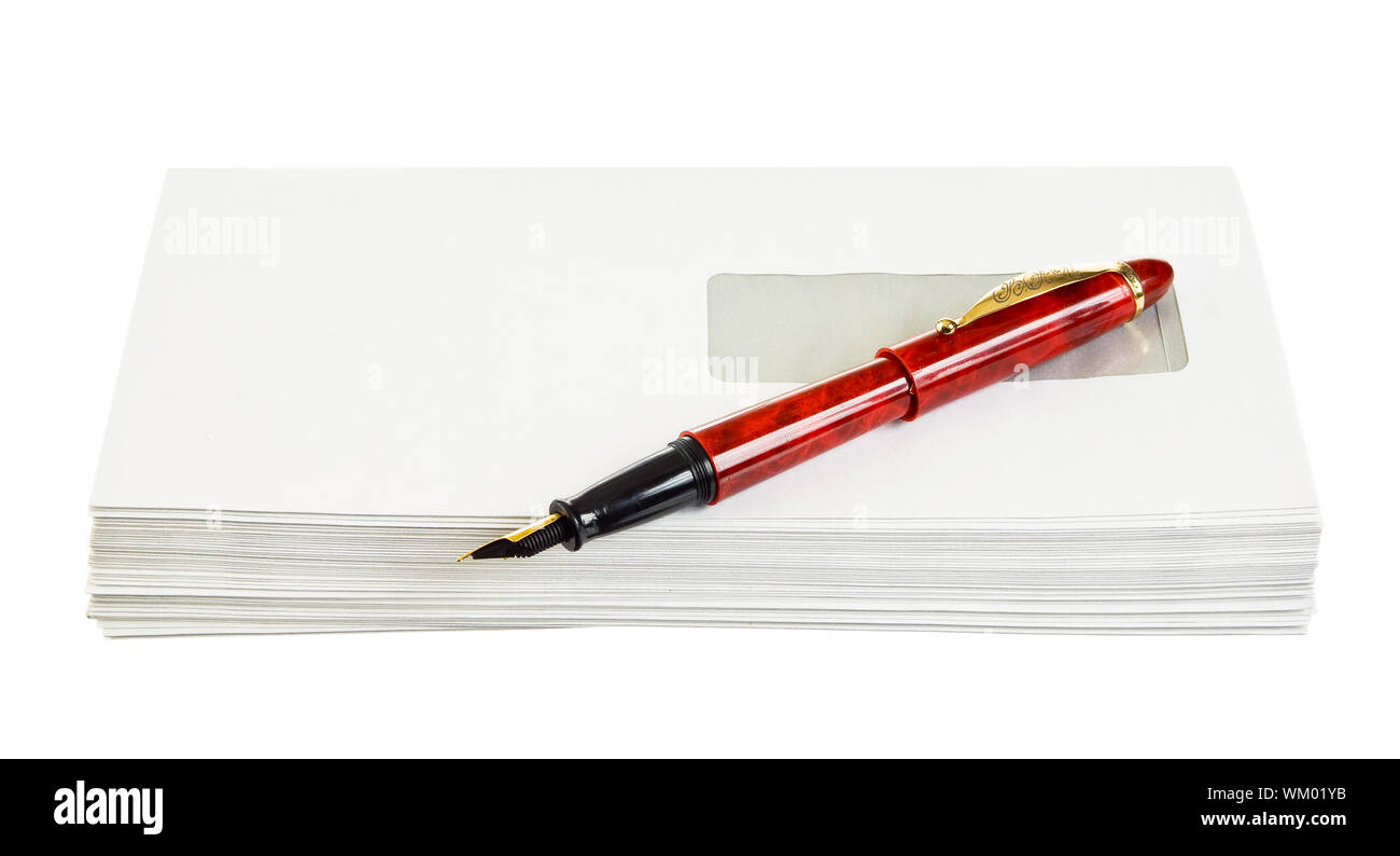 envelopes for letters and pen isolated on white background Stock Photo ...