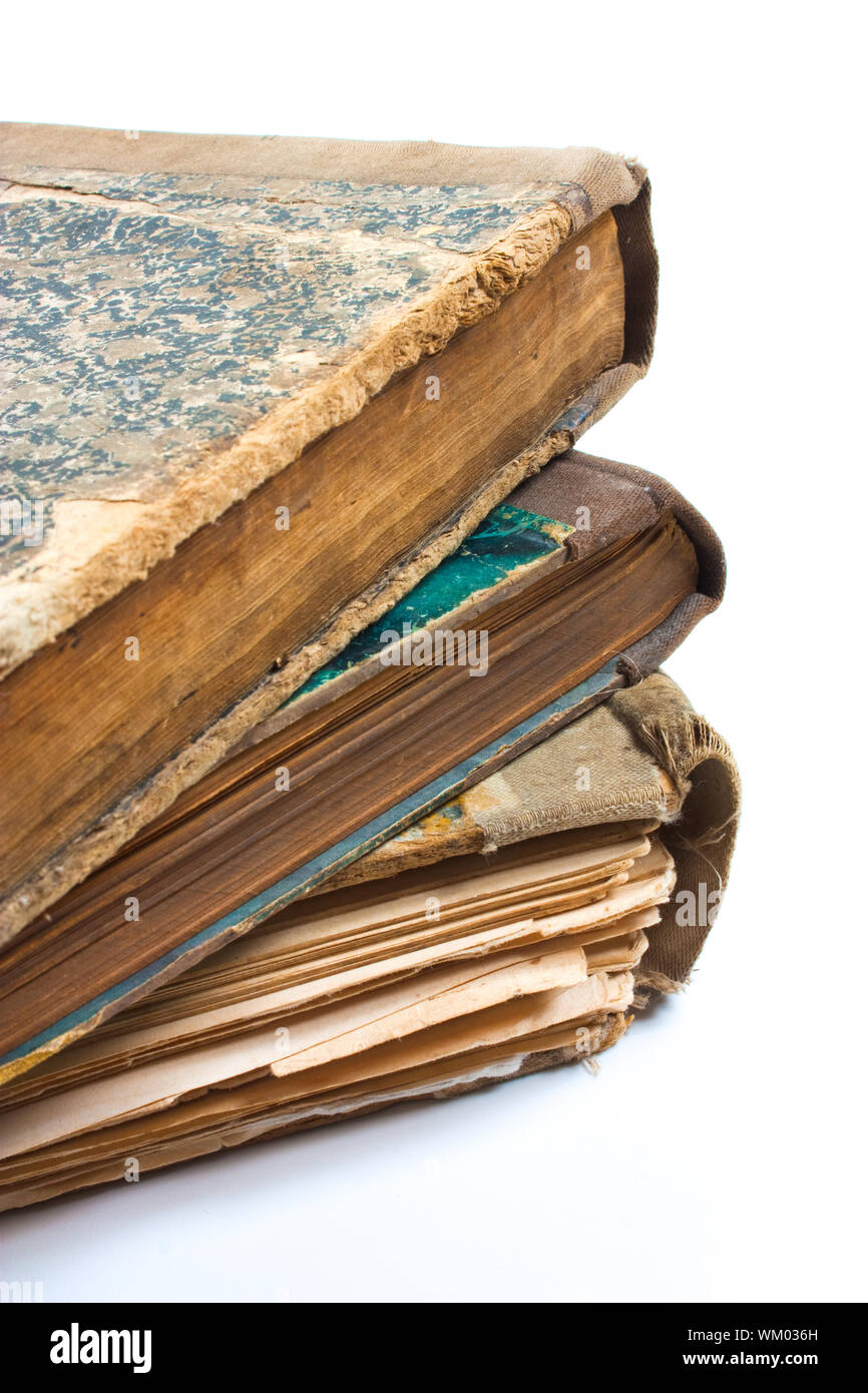 An old book with a crumpled sheet and hardcover isolated on white ...