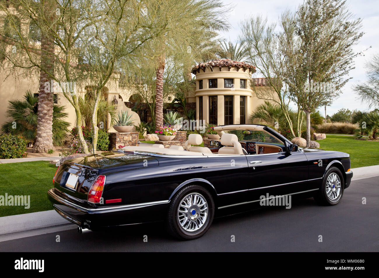 Convertible car parked outside mansion house Stock Photo - Alamy Convertible car parked outside mansion house Stock Photo - Alamy