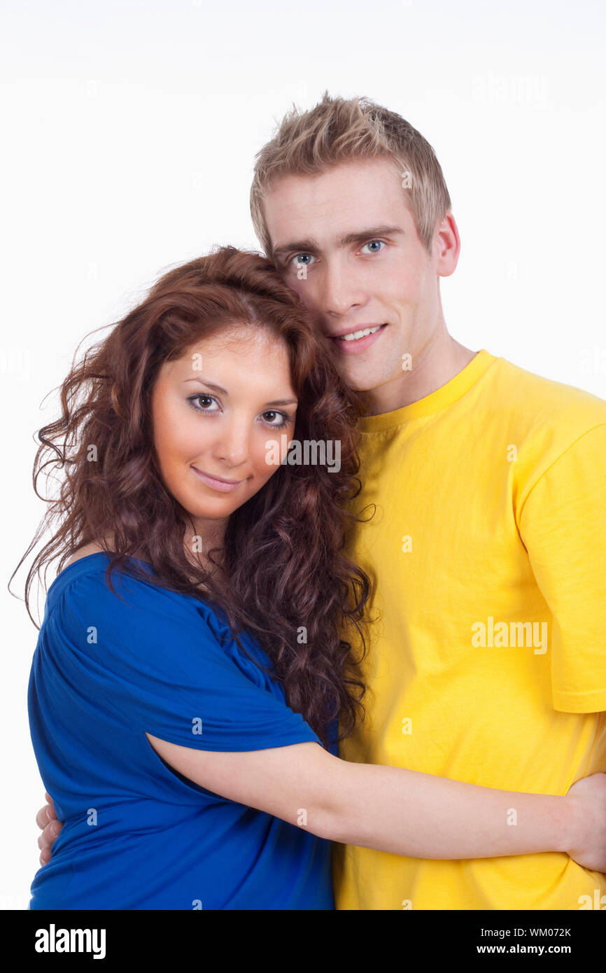 happy young couple - boy embracing girl, smiling - isolated on white ...