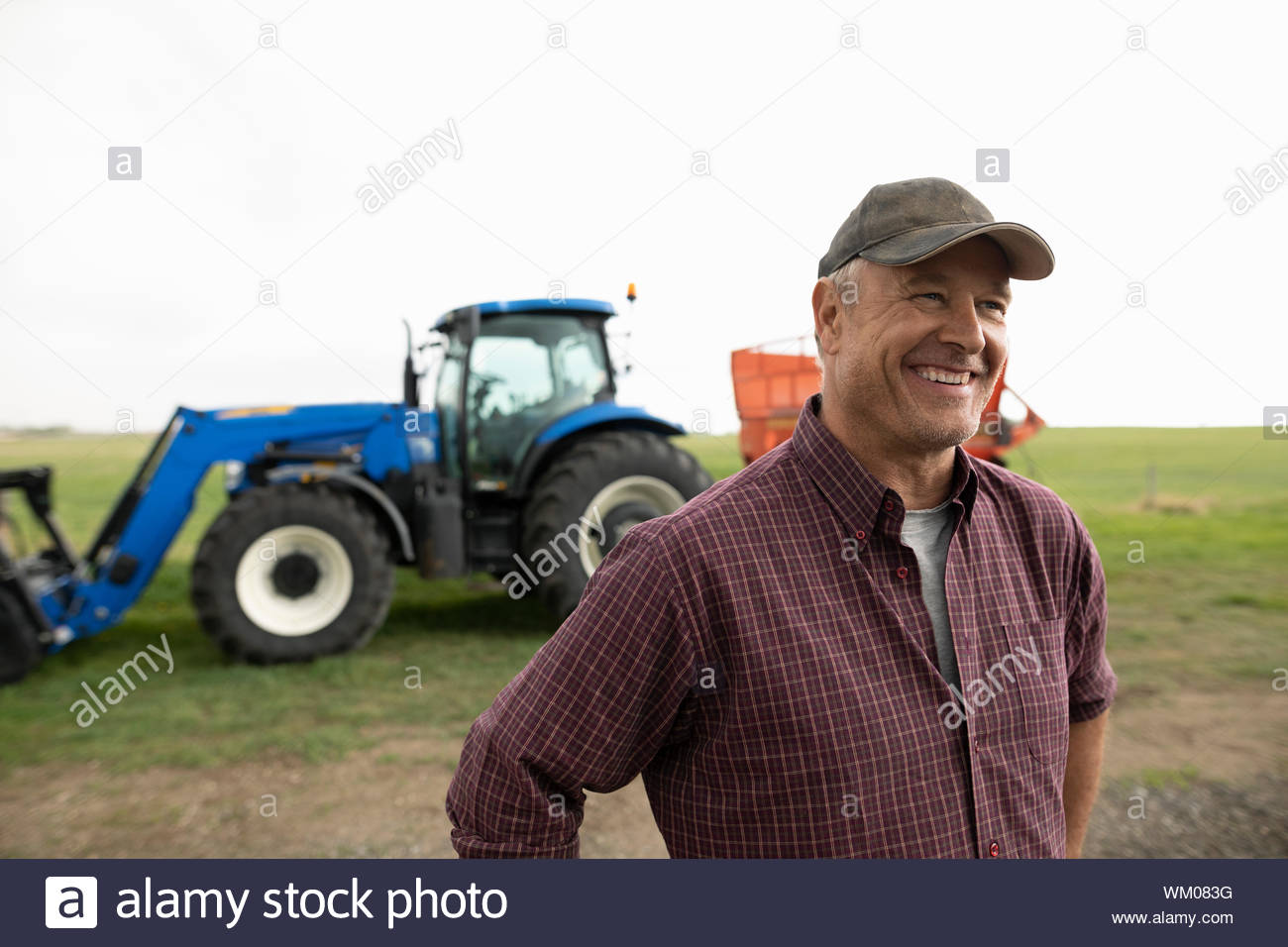 Farmer posing with tractor hi-res stock photography and images - Alamy