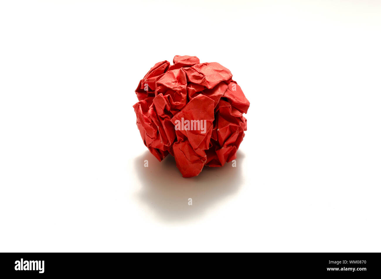 red crumpled paper ball Stock Photo - Alamy