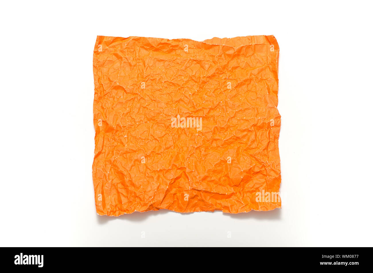 orange crumpled paper texture on a white background Stock Photo - Alamy