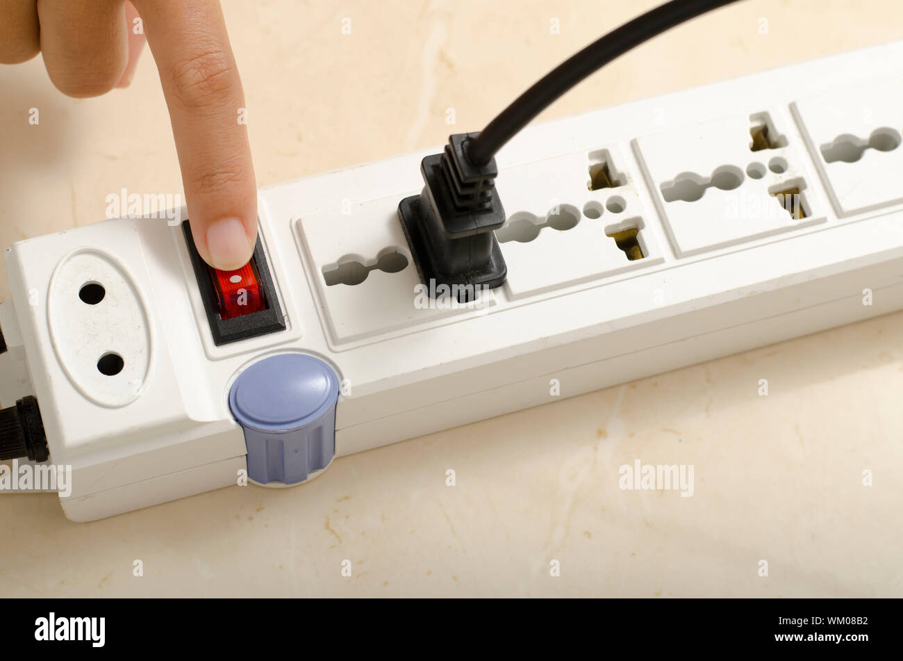 asia woman hand turn on switch multiple socket plug electric Stock ...