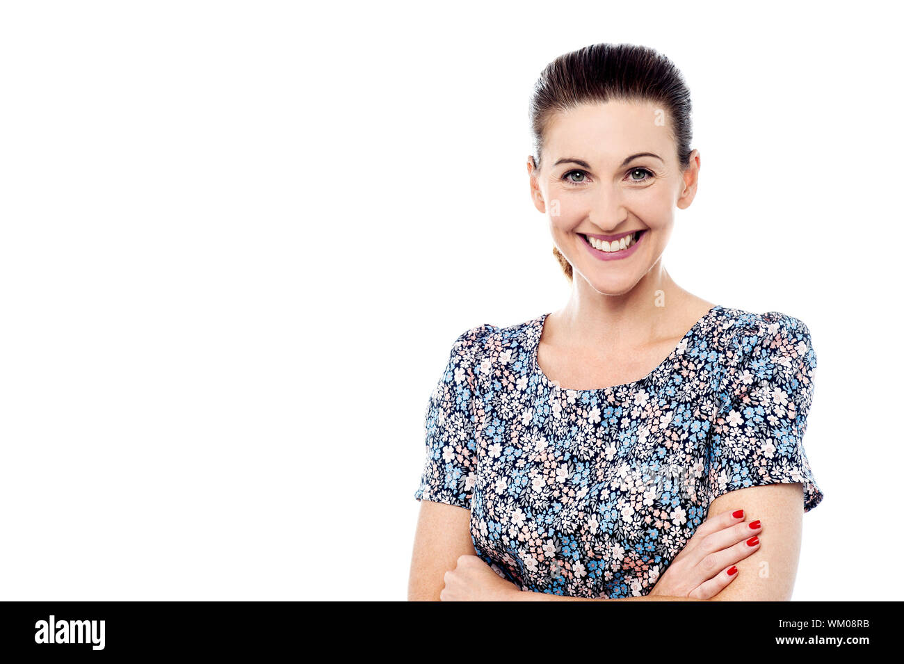 Beautiful woman posing with confidence, arms folded Stock Photo - Alamy