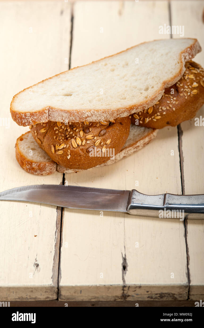 organic bread over rustic table Stock Photo - Alamy