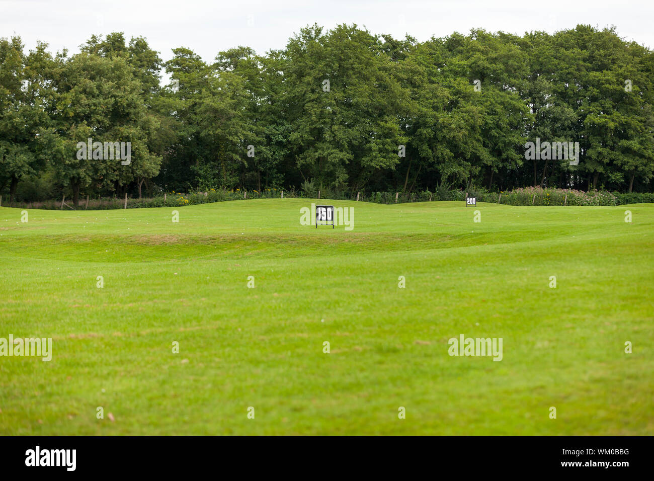 Empty Golf Ball Baskets at Driving Range Stock Photo - Alamy