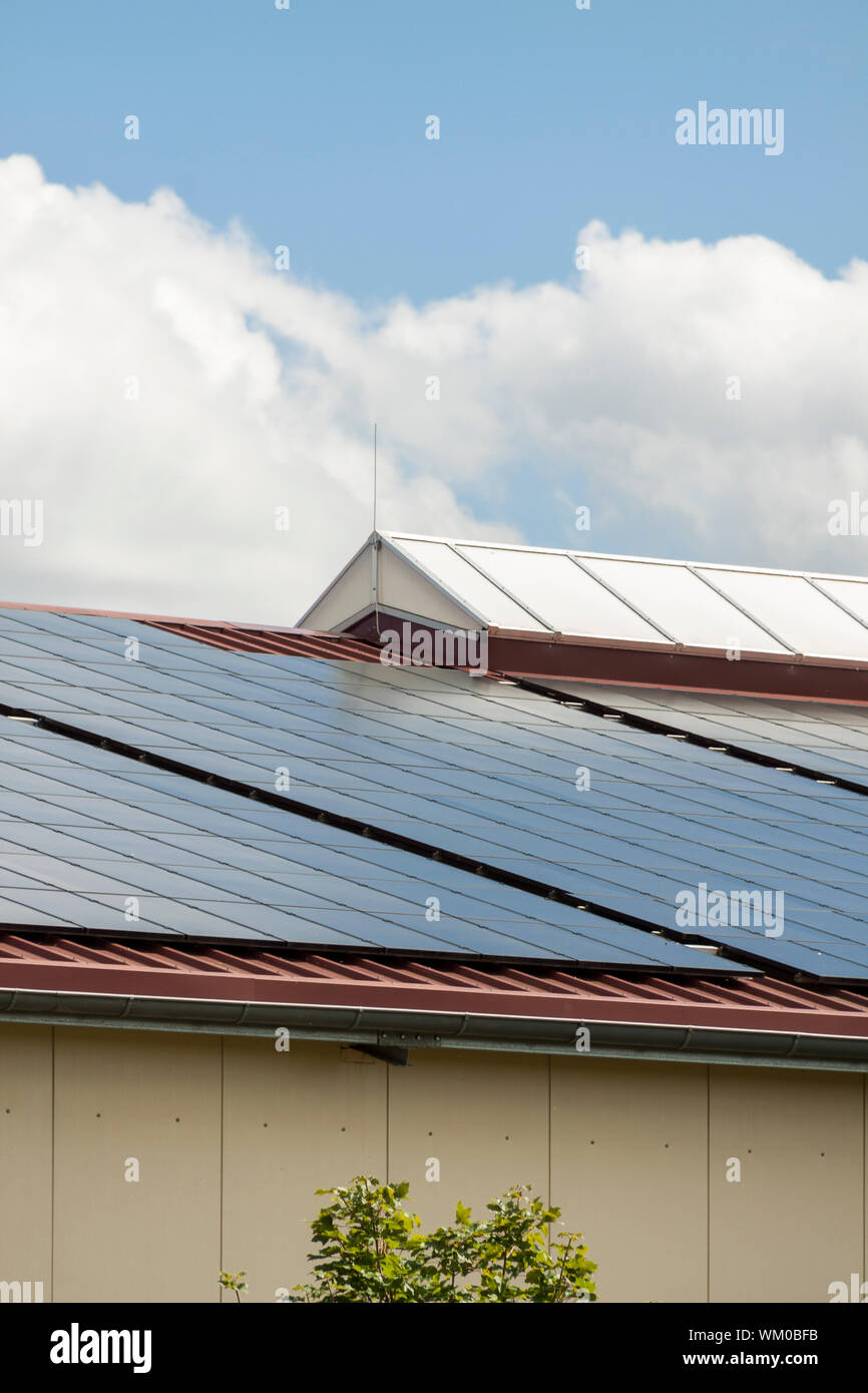 Photovoltaic solar panels on a roof Stock Photo - Alamy