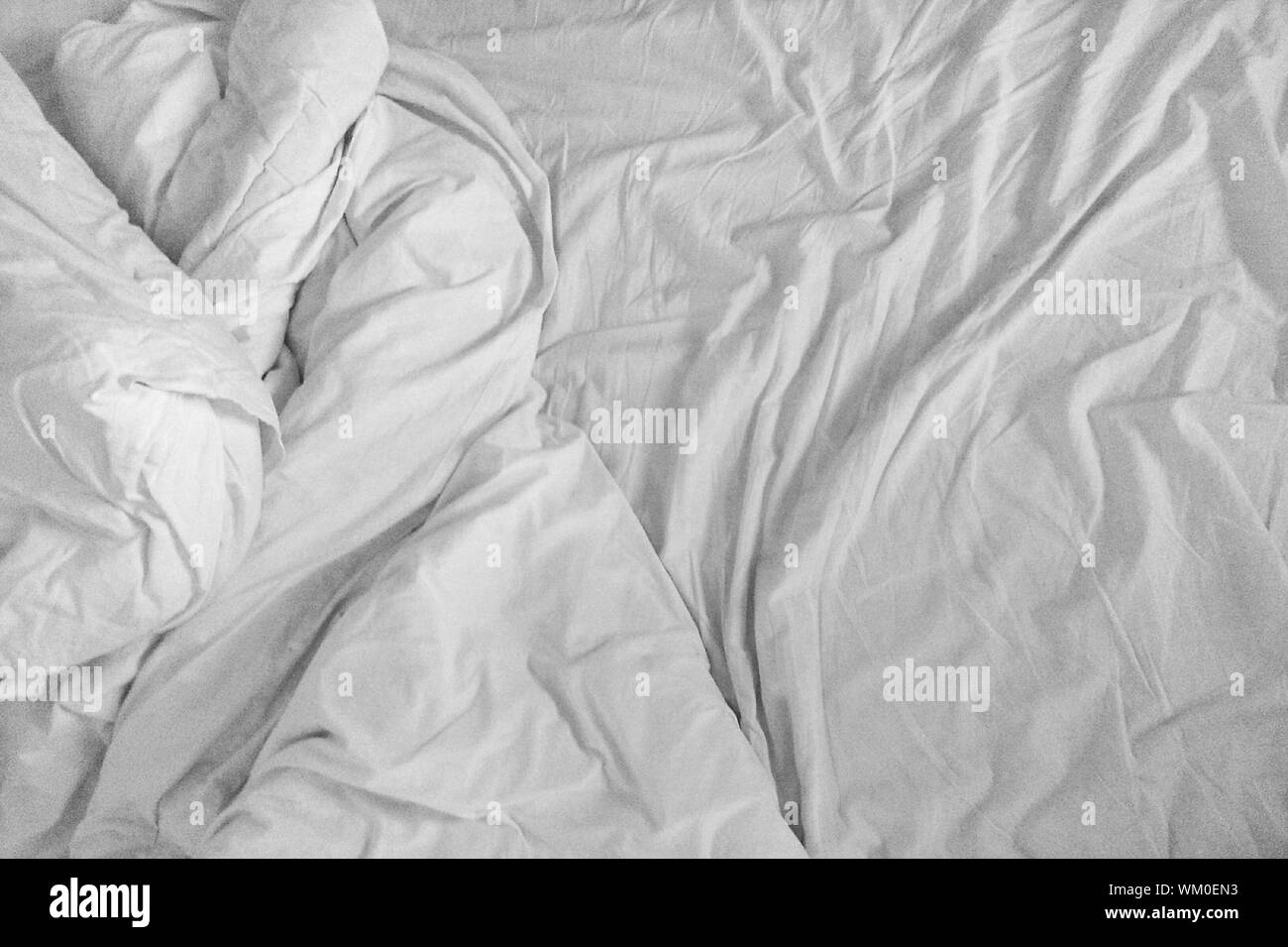 Crumpled bed Black and White Stock Photos & Images - Alamy