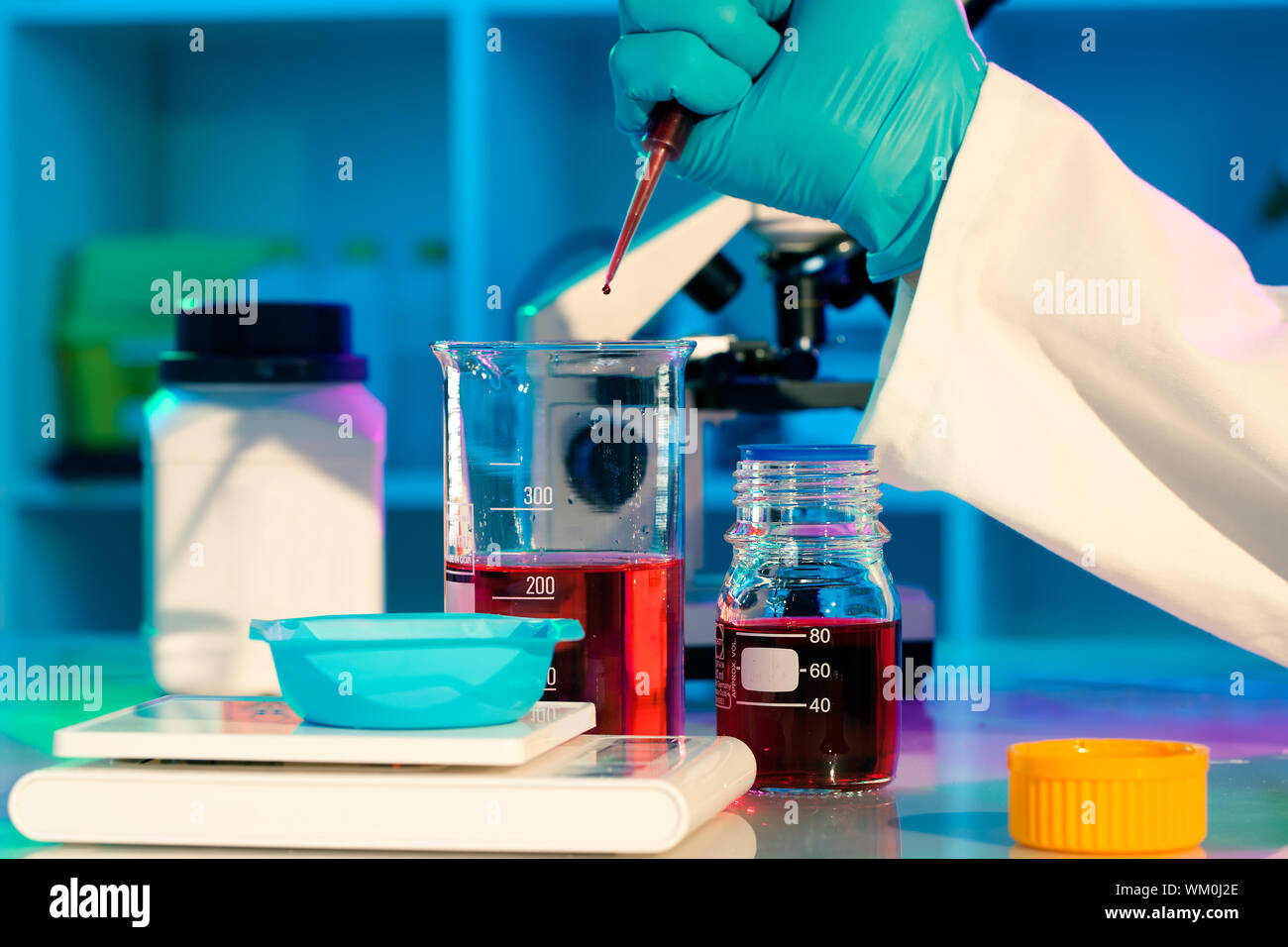 researchers work in modern scientific lab. Preparation of hazardous ...