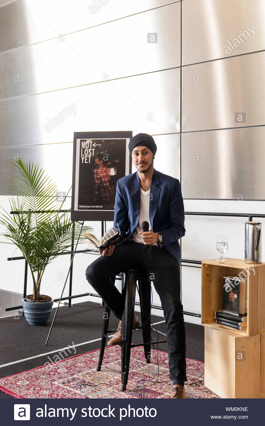 Portrait indian young man reading hi-res stock photography and images ...