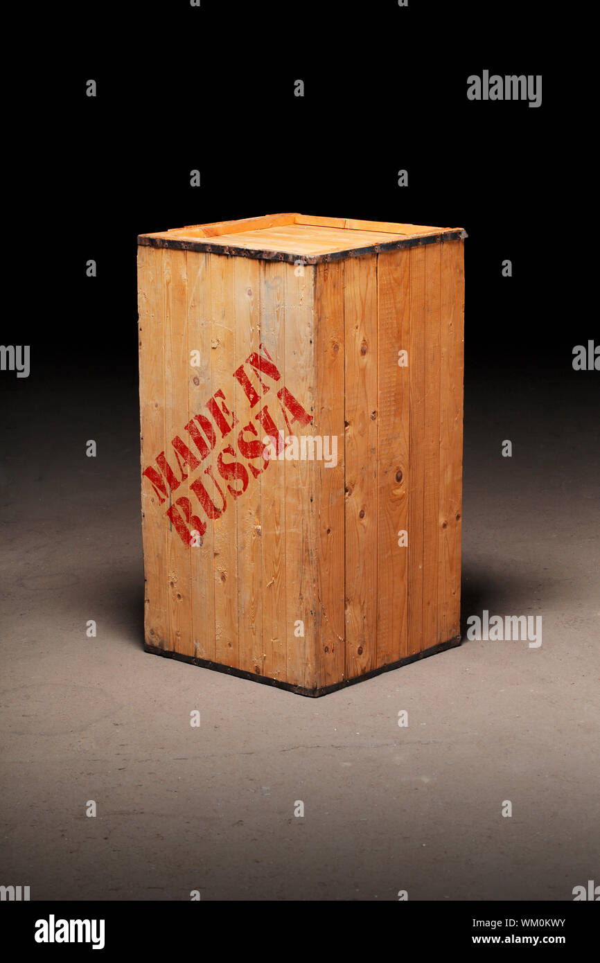Conceptual image of a wooden crate with text "Made in Russia Stock ...