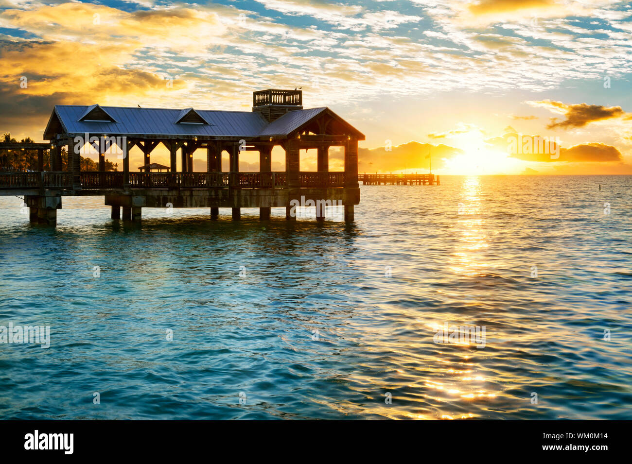 Pier at the beach in Key West, Florida USA Stock Photo - Alamy