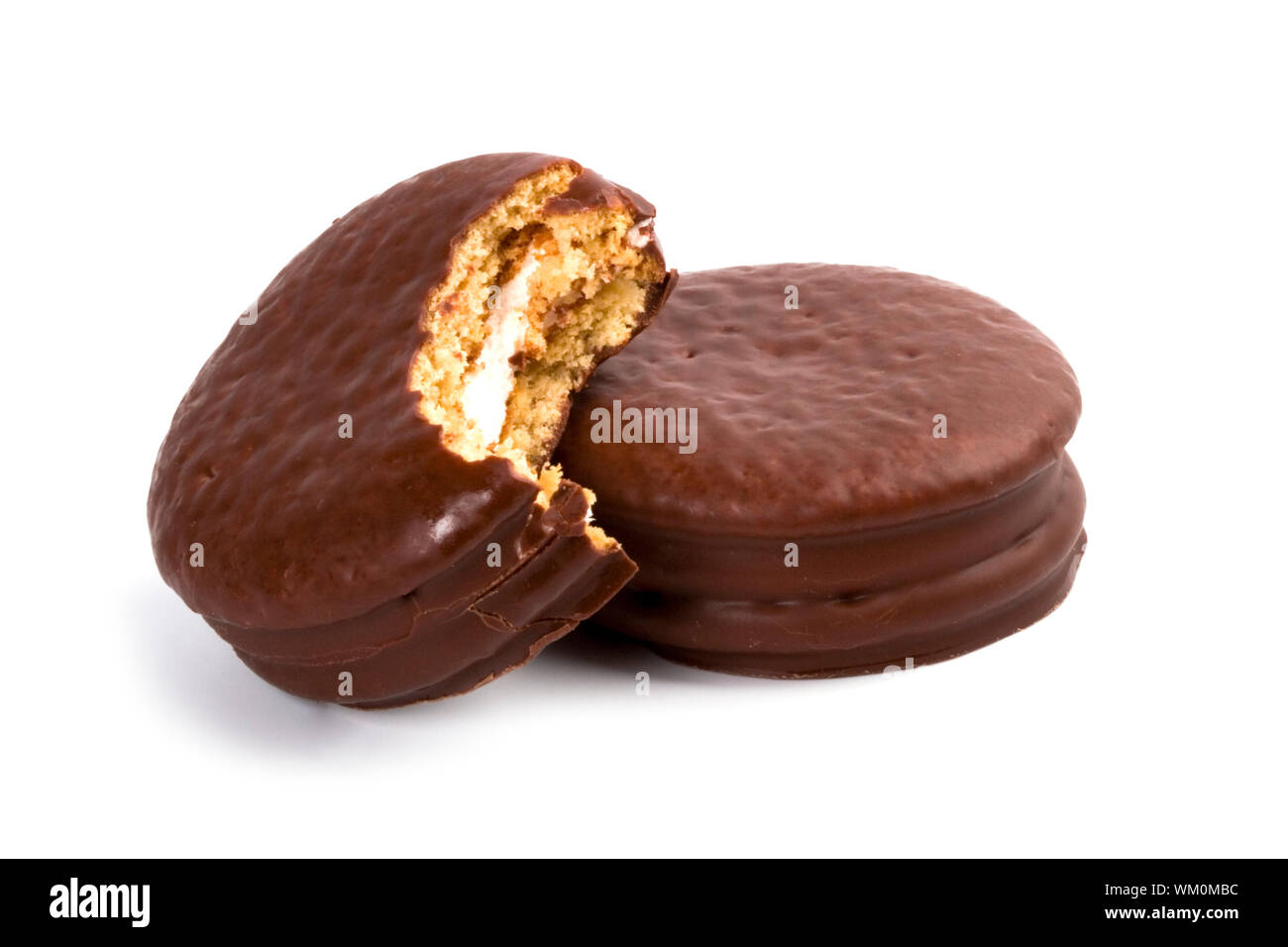 two chocolate cookies isolated on white background Stock Photo - Alamy