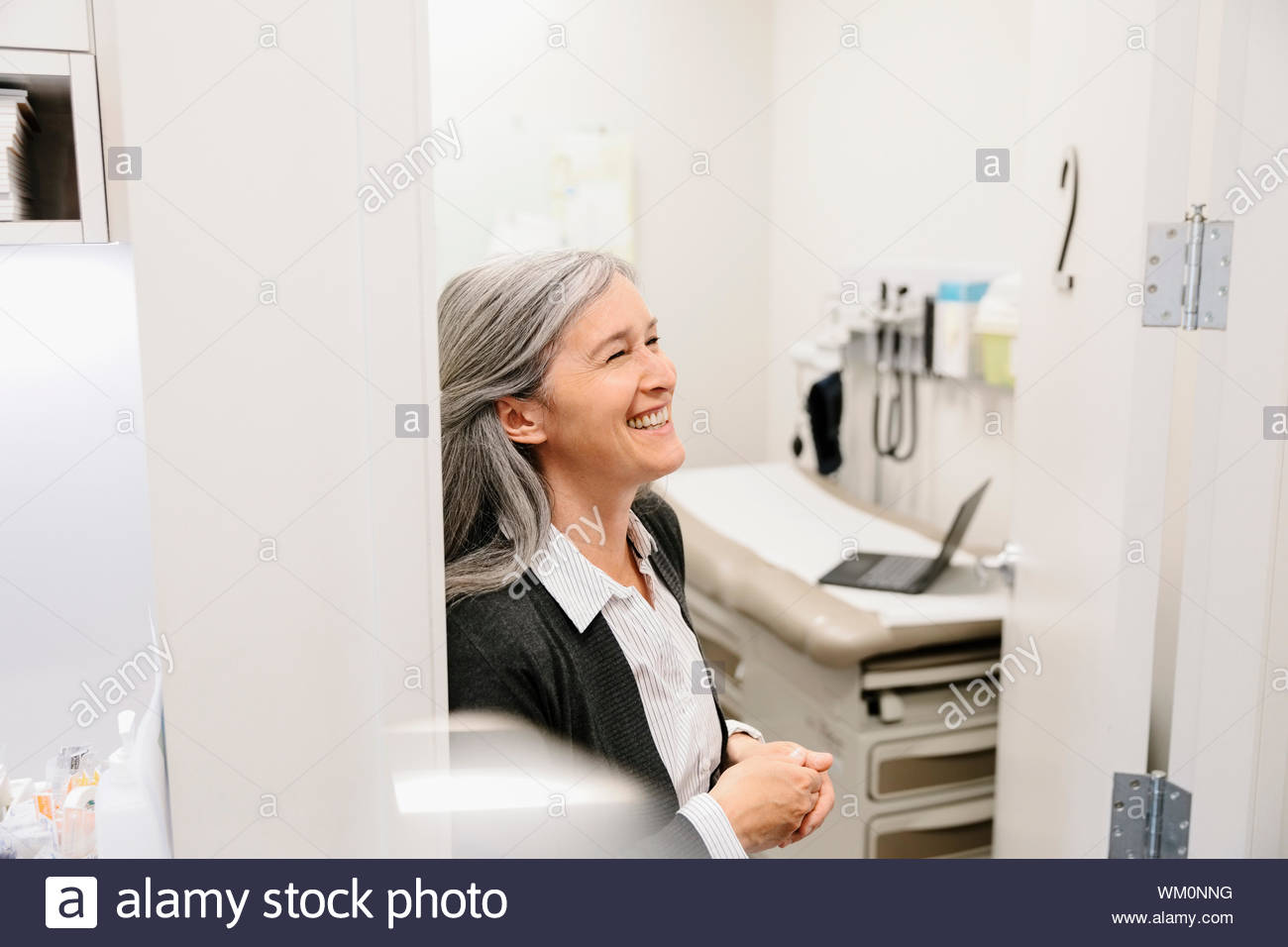Female doctor laughing hi-res stock photography and images - Alamy