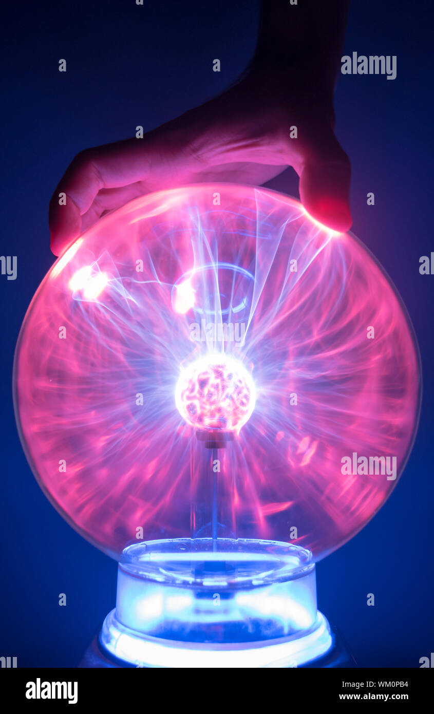 Plasma ball hands hi-res stock photography and images - Alamy