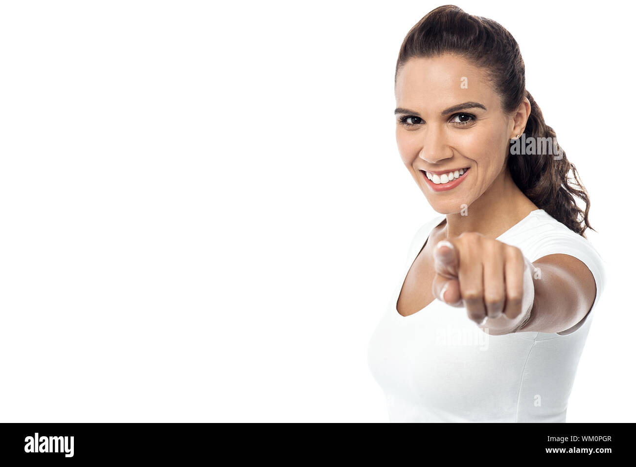 Beautiful female pointing her finger towards you Stock Photo - Alamy