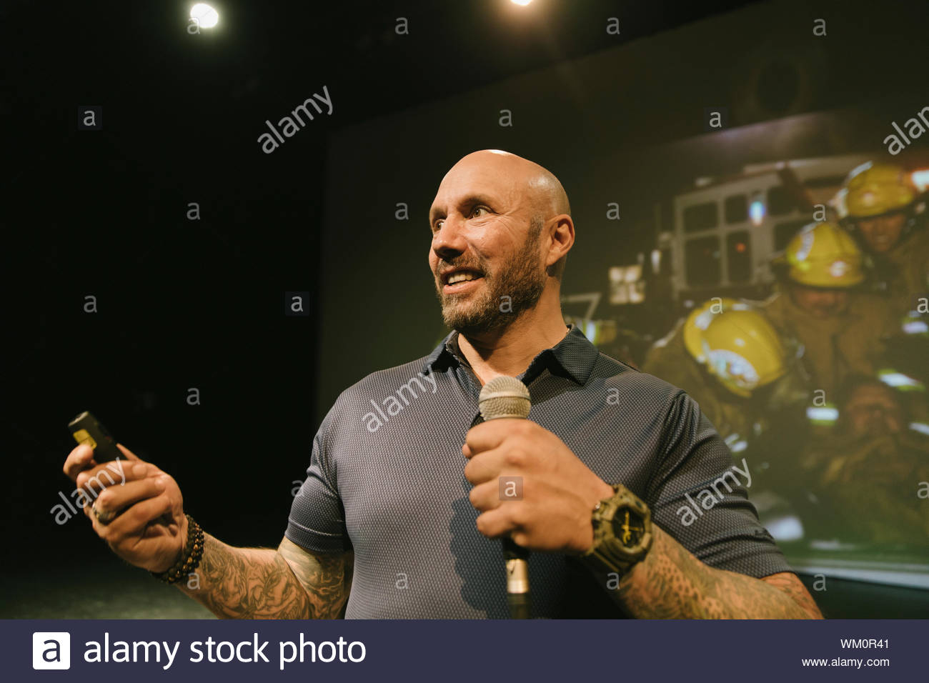 Man giving speech with image projection hi-res stock photography and ...