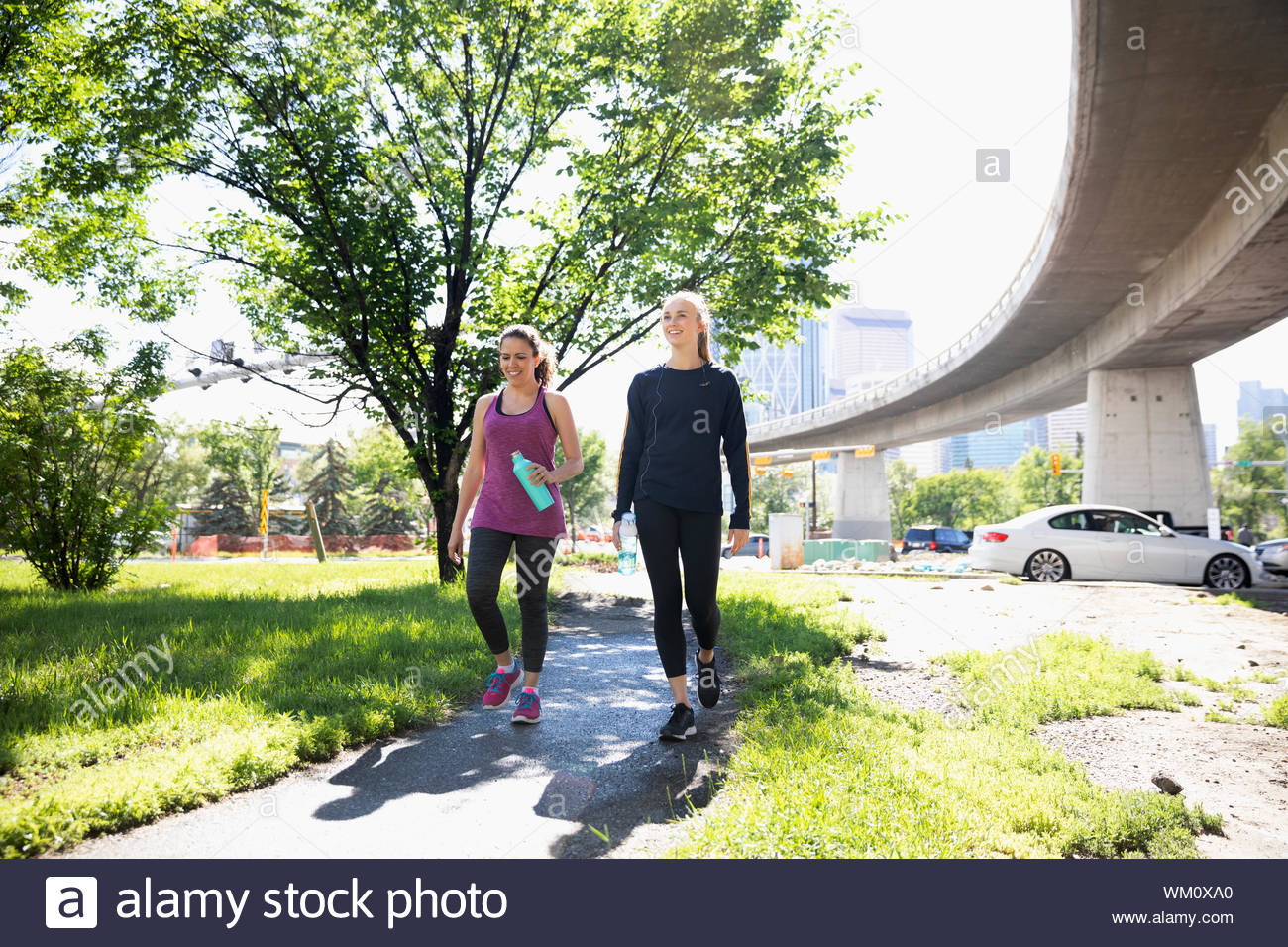 Walking and drinking and urban hi-res stock photography and images - Alamy