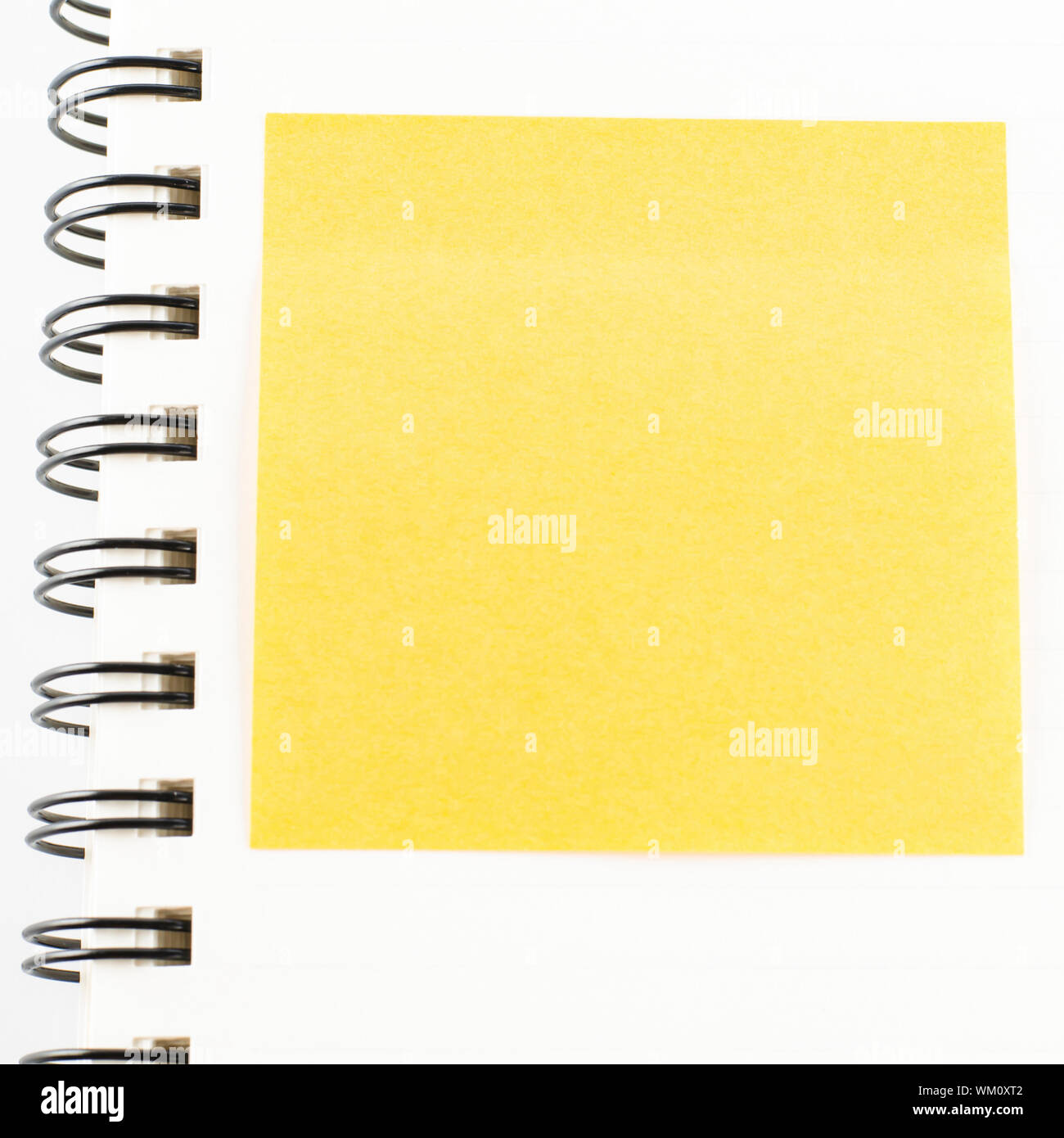 sticker note on notebook Stock Photo - Alamy