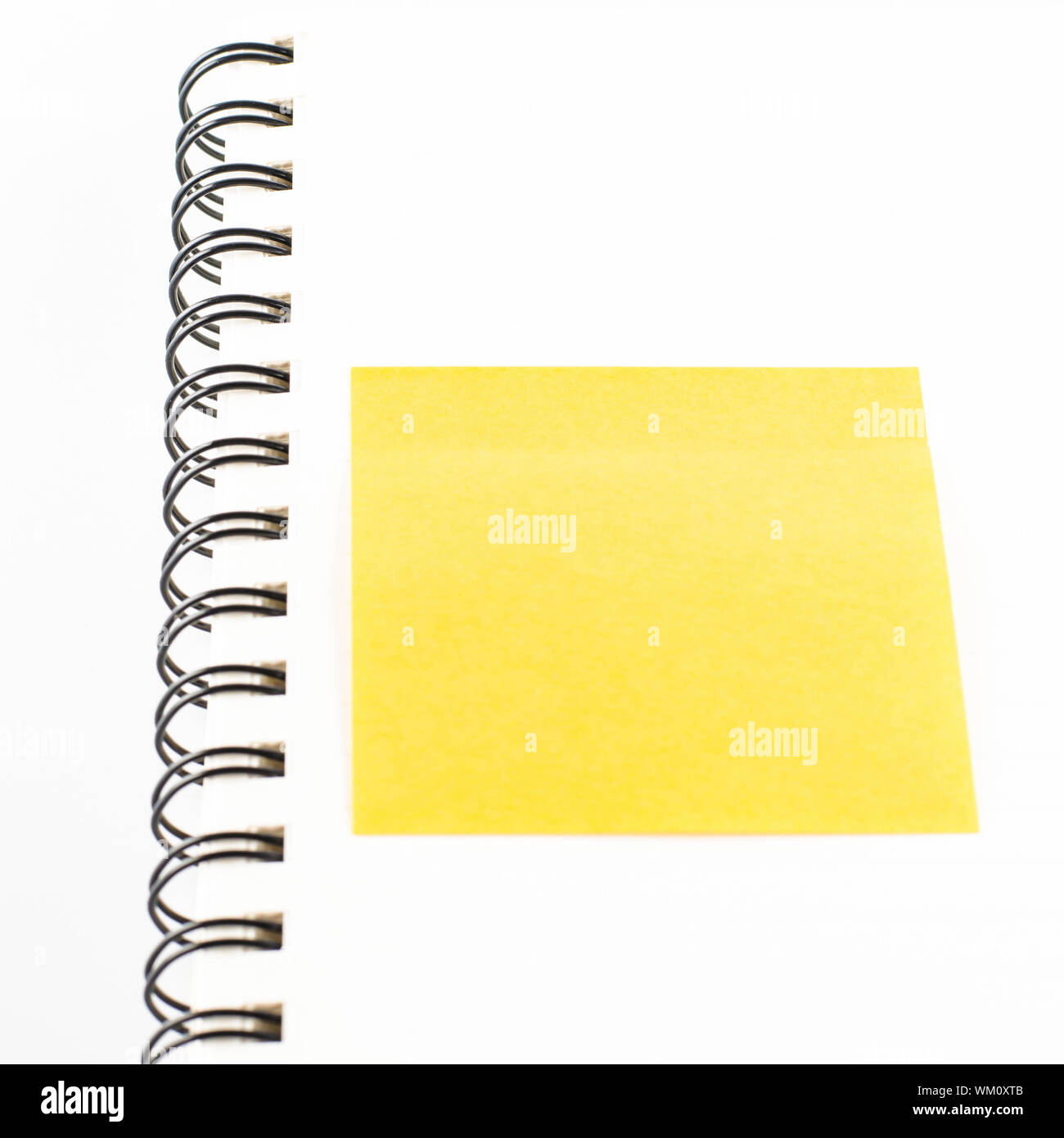 sticker note on notebook Stock Photo - Alamy