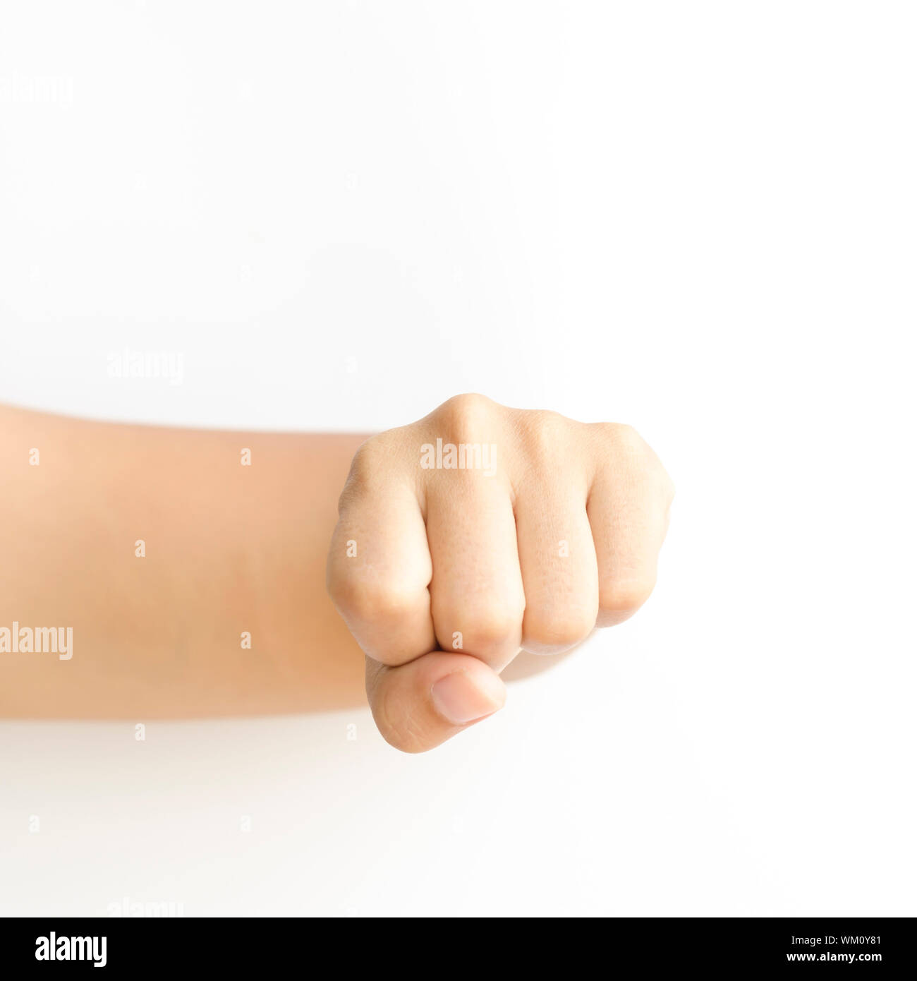 asia woman strength hand sign on a white background Stock Photo - Alamy