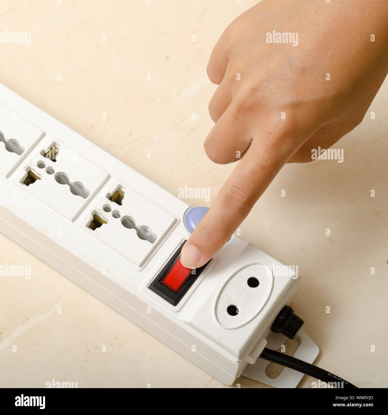 asia woman hand turn on switch multiple socket plug electric Stock ...