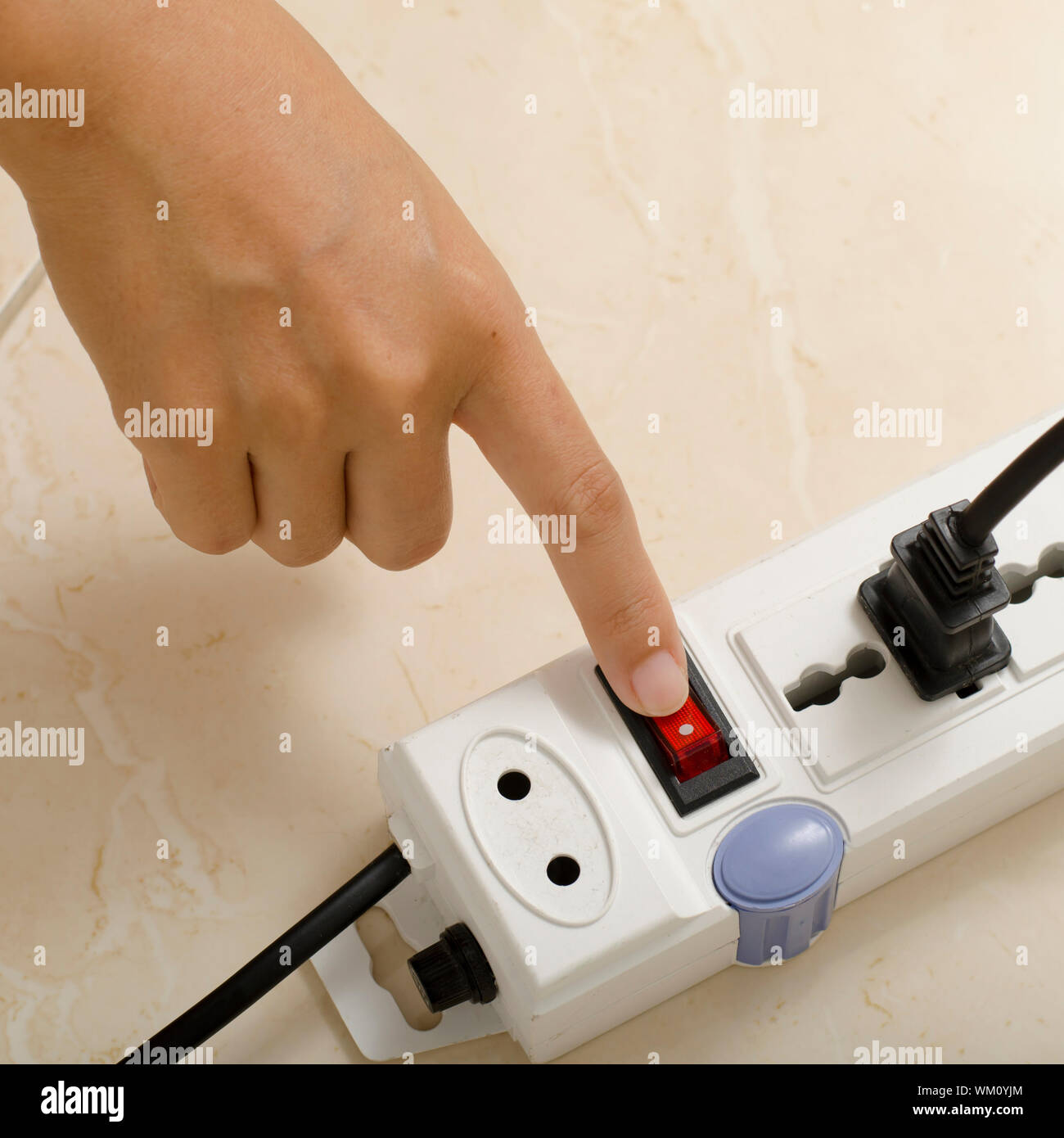 asia woman hand turn on switch multiple socket plug electric Stock ...