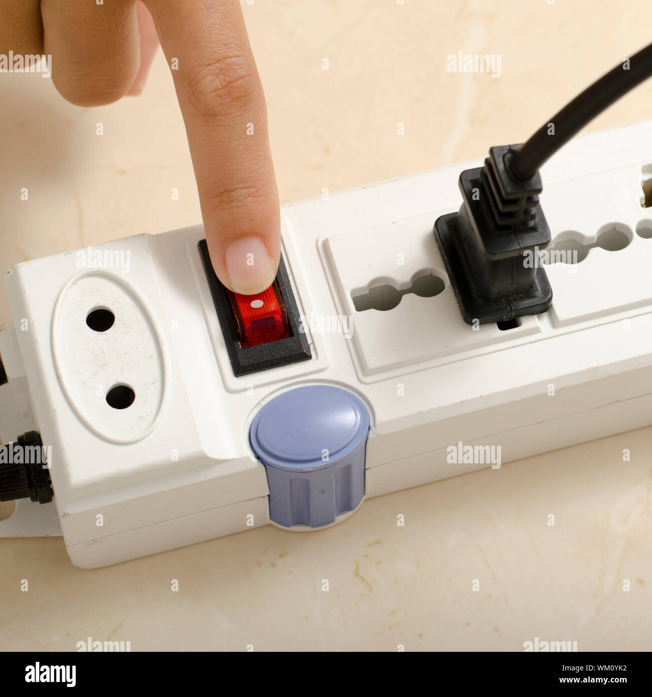 asia woman hand turn on switch multiple socket plug electric Stock ...