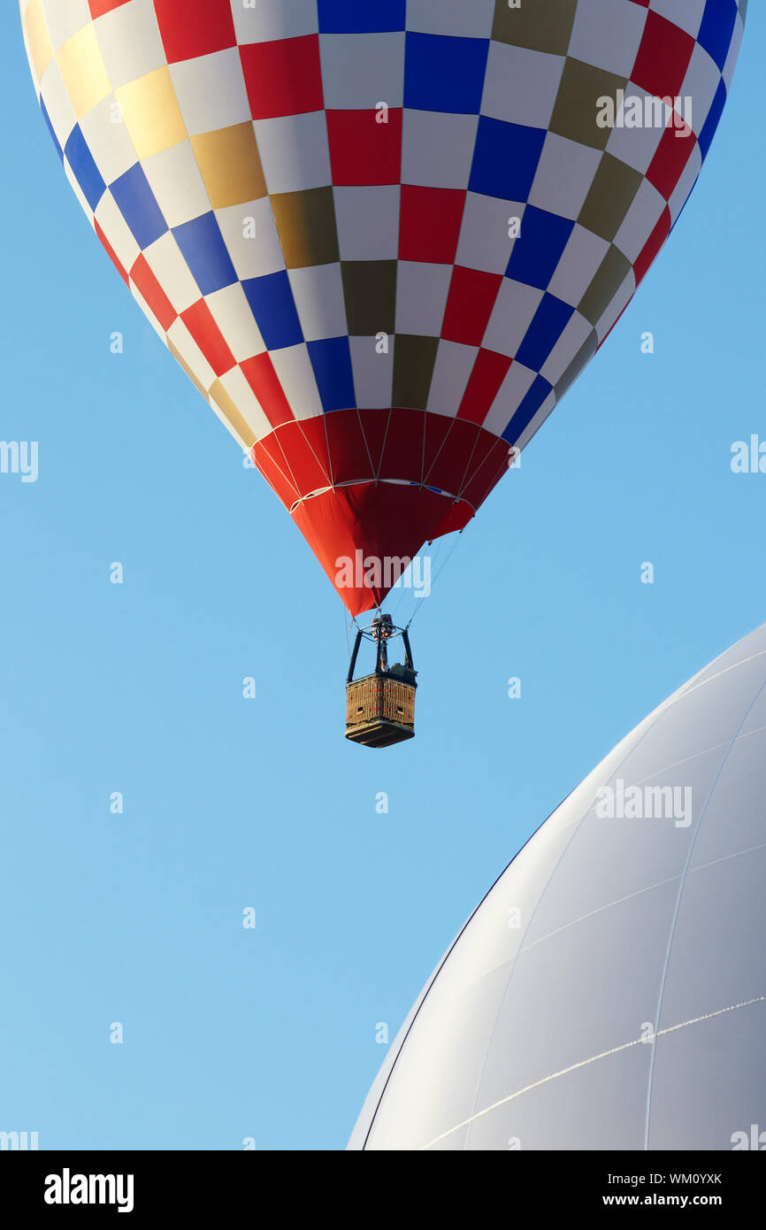 Hot air balloon lifting up hi-res stock photography and images - Alamy