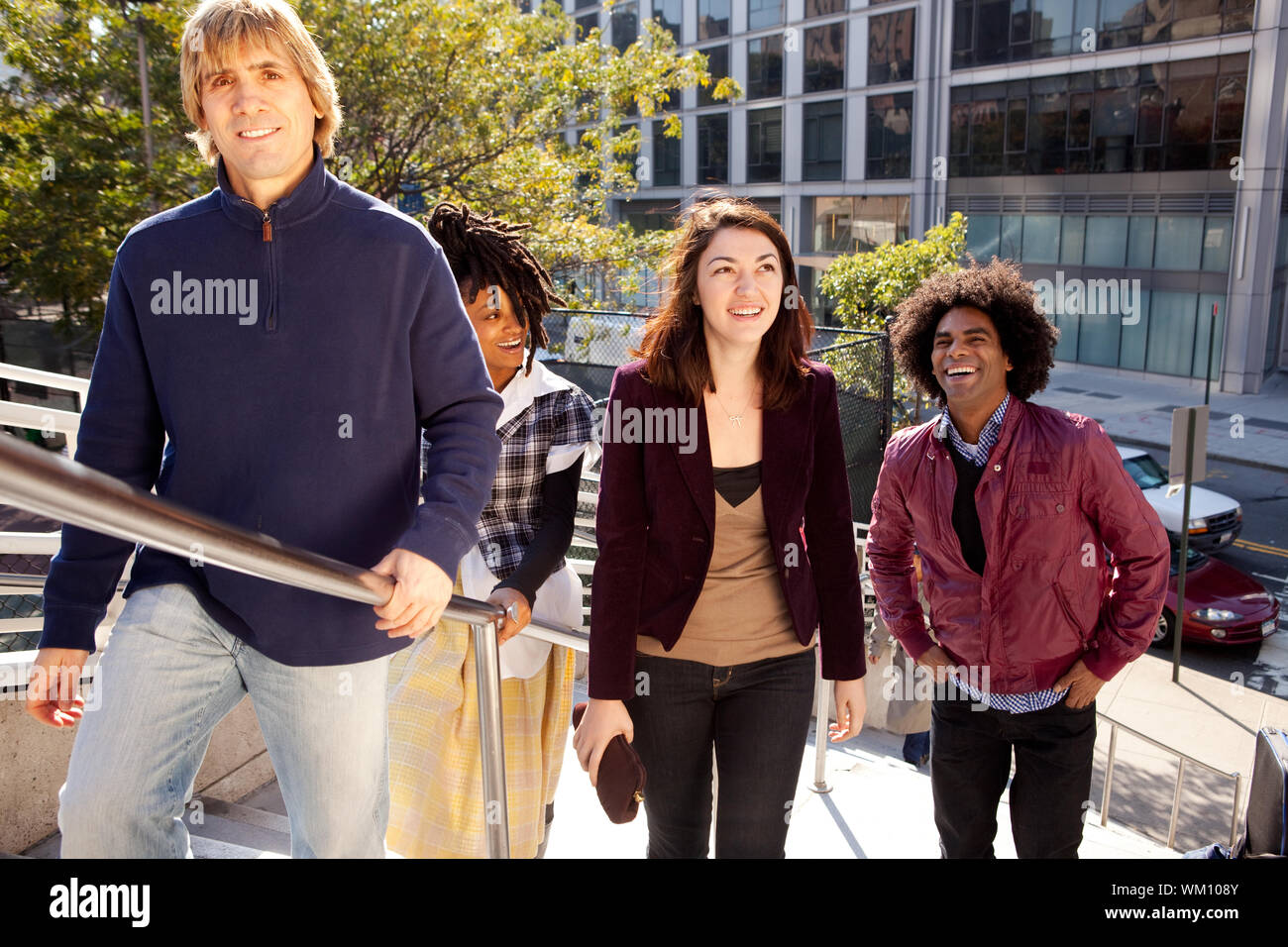 A candid of a group of friends in the city Stock Photo - Alamy