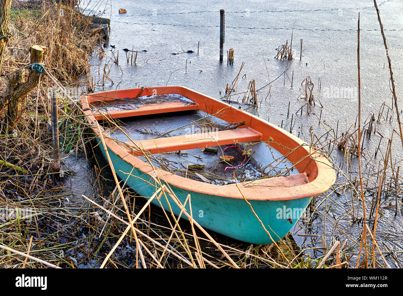 Row boat frozen in hi-res stock photography and images - Alamy