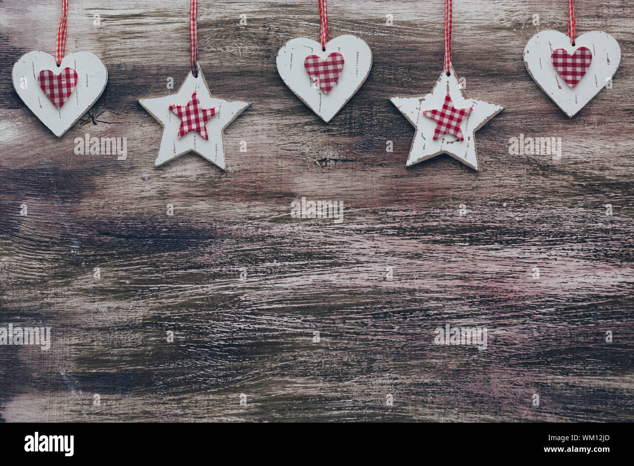 Shabby chic wooden shapes on rustic background Stock Photo - Alamy
