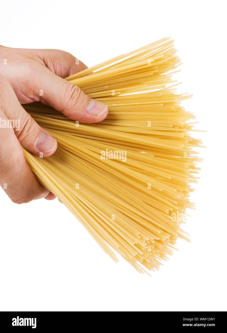 spaghetti in hands isolated on white background Stock Photo - Alamy