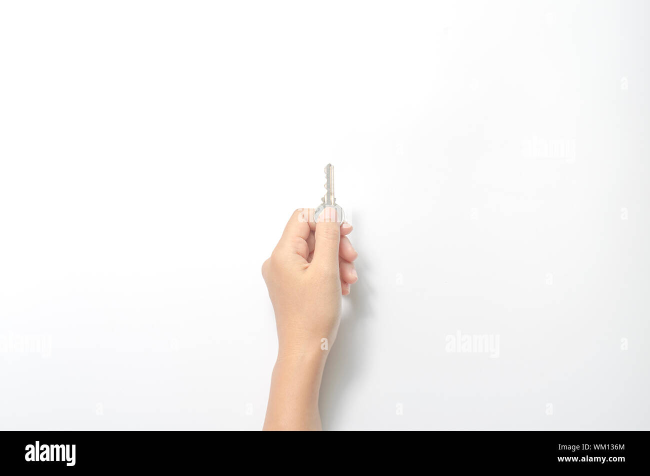 hand holding key Stock Photo - Alamy