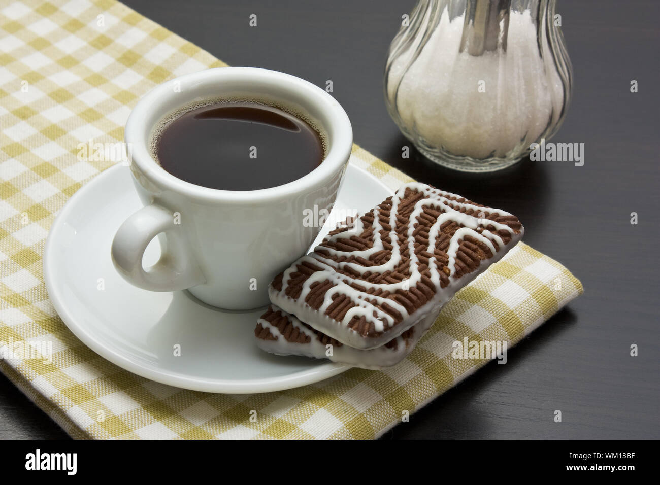 cup of black coffee with biscuits Stock Photo - Alamy