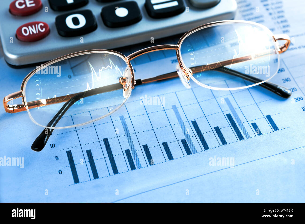 finances and economical background.Statistic, graphics and glasses ...
