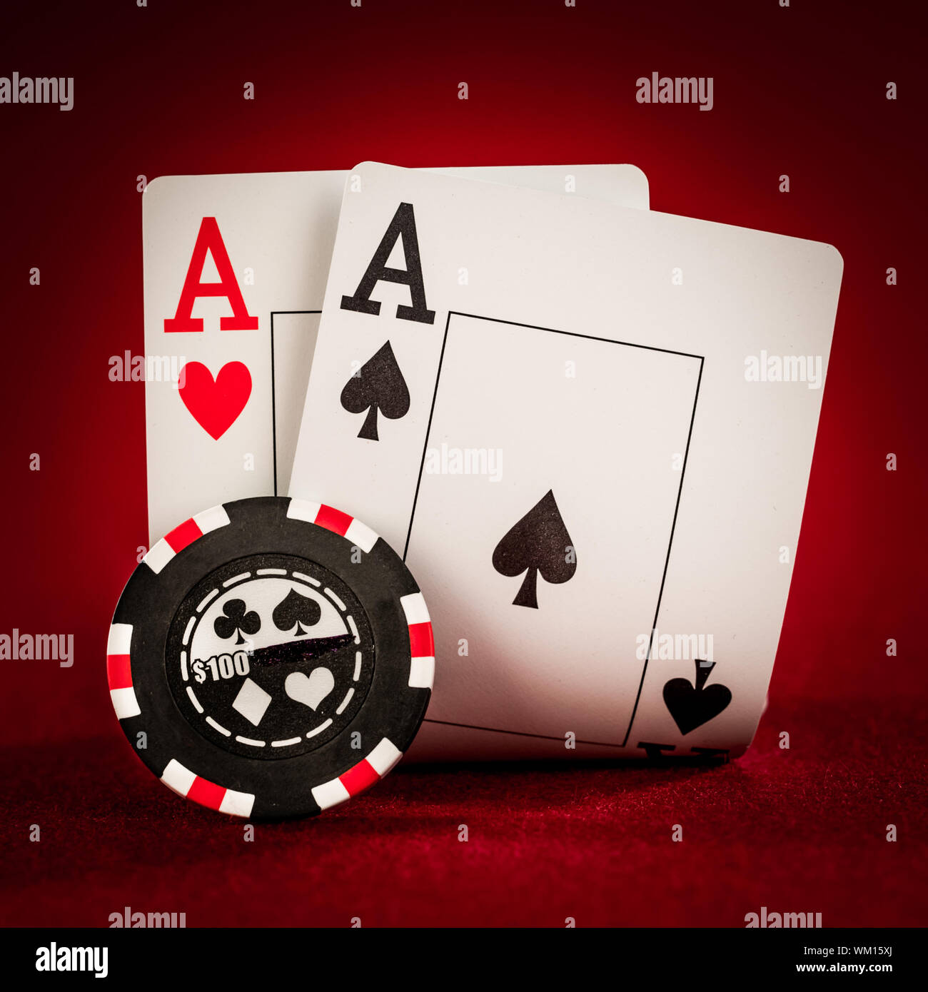 Stack of chips and two aces Stock Photo - Alamy