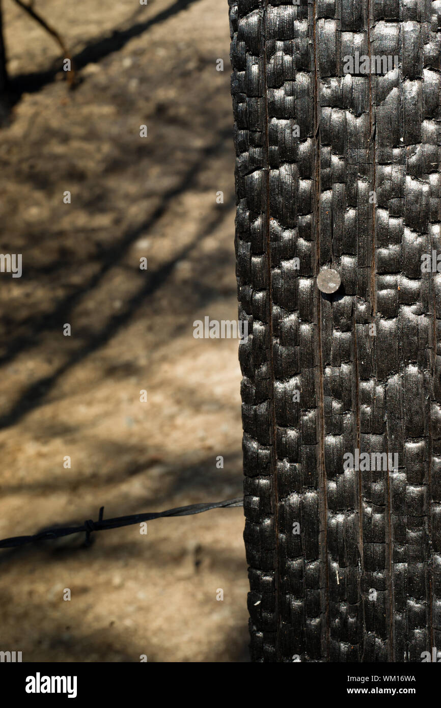 Burnt fence post hi-res stock photography and images - Alamy